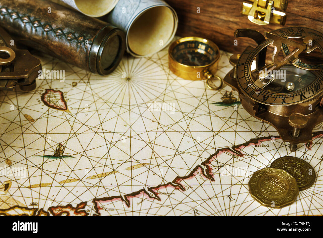 Vintage toned men's still life with compass, sextant, spyglass and old ...