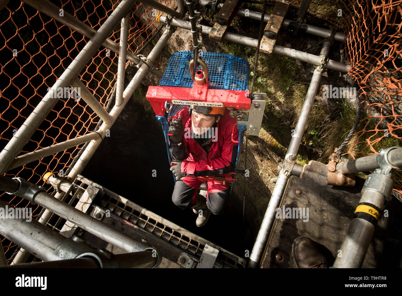 A potholer is winched into gaping gill hi-res stock photography and ...