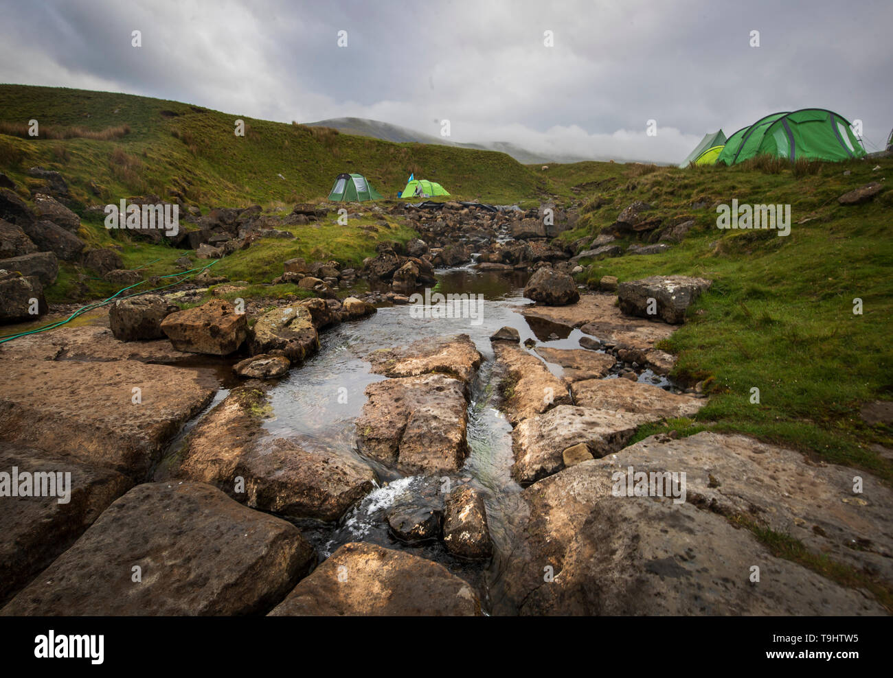 The Fell Beck runs through a campsite close to the entrance of Gaping ...