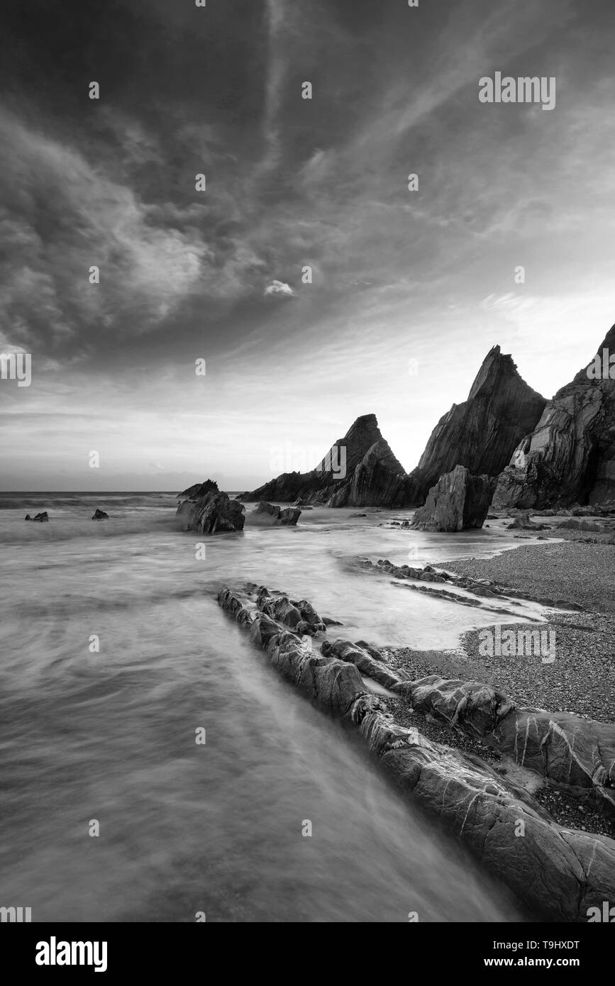 Beautiful black and white sunset landscape image of Westcombe Beach in ...