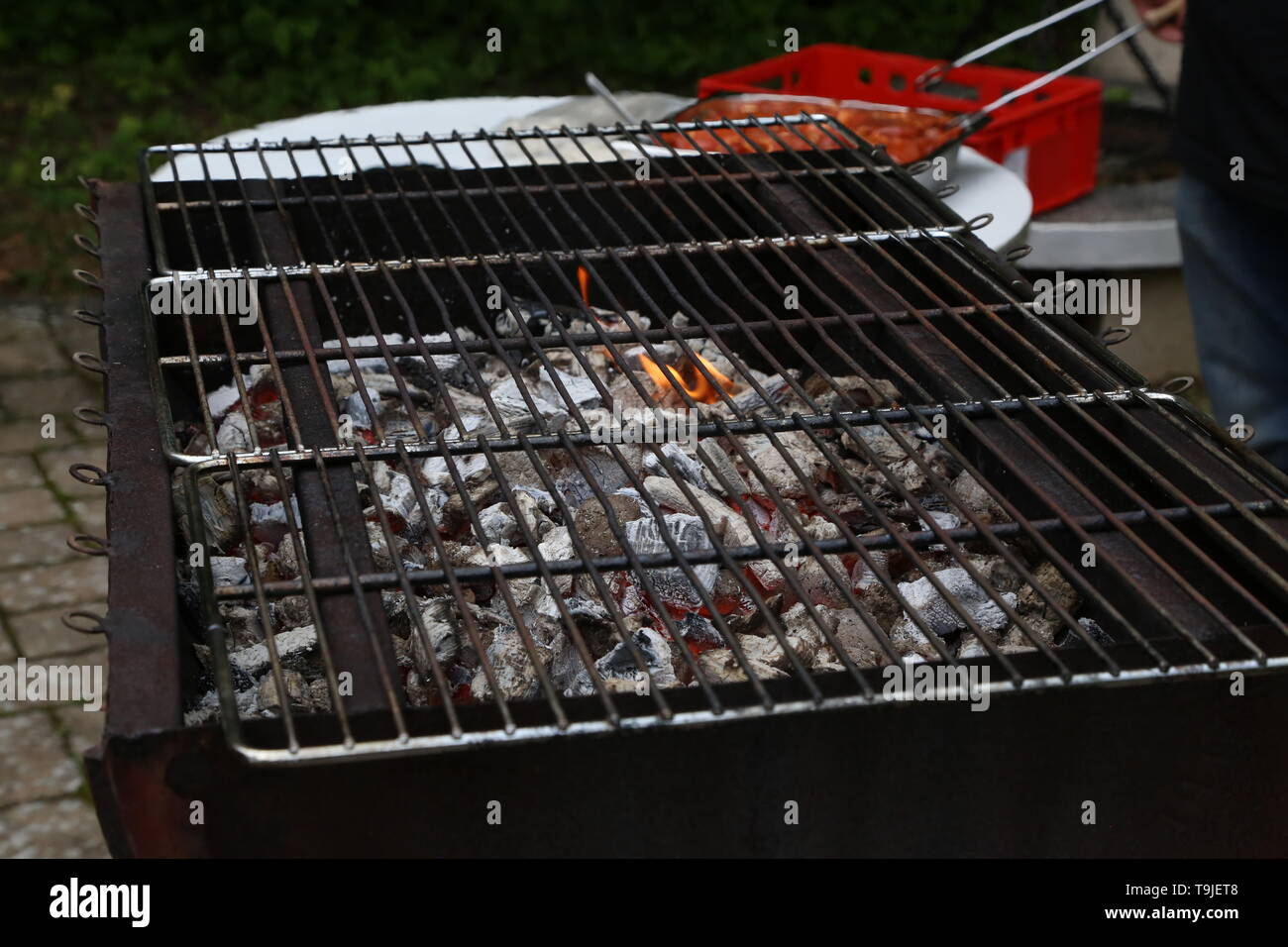 Kindling of fire for cooking on a grill Stock Photo - Alamy