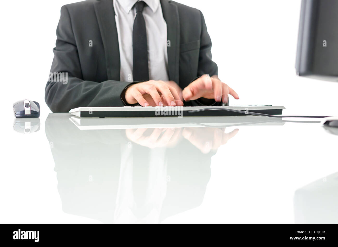 Front view of office worker typing on computer keyboard Stock Photo - Alamy