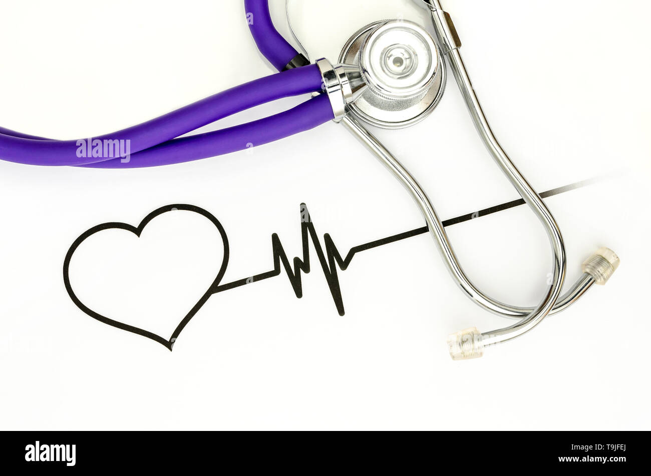 Top view of hand drawn heart beating cardiograph and stethoscope next ...