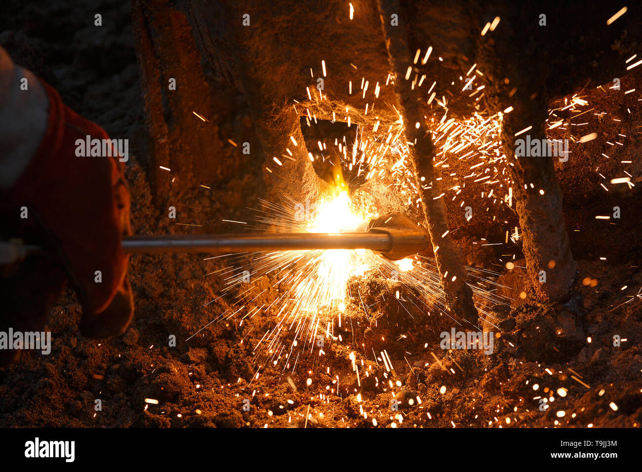 Welding machine with melting metal drops and sparks of sparks Stock ...