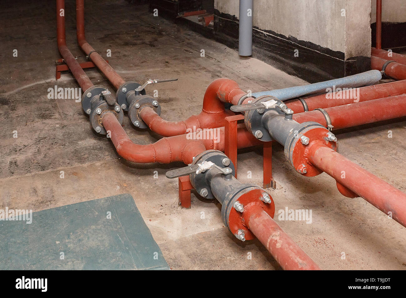 Pipes of hot water supply on the technical floor Stock Photo - Alamy