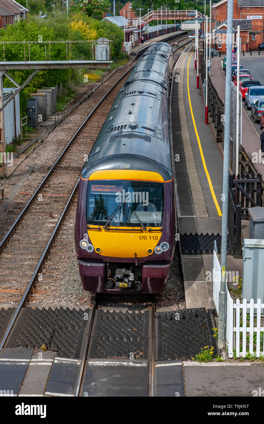 Train pulling into Oakham station on a Friday afternoon, looking down ...