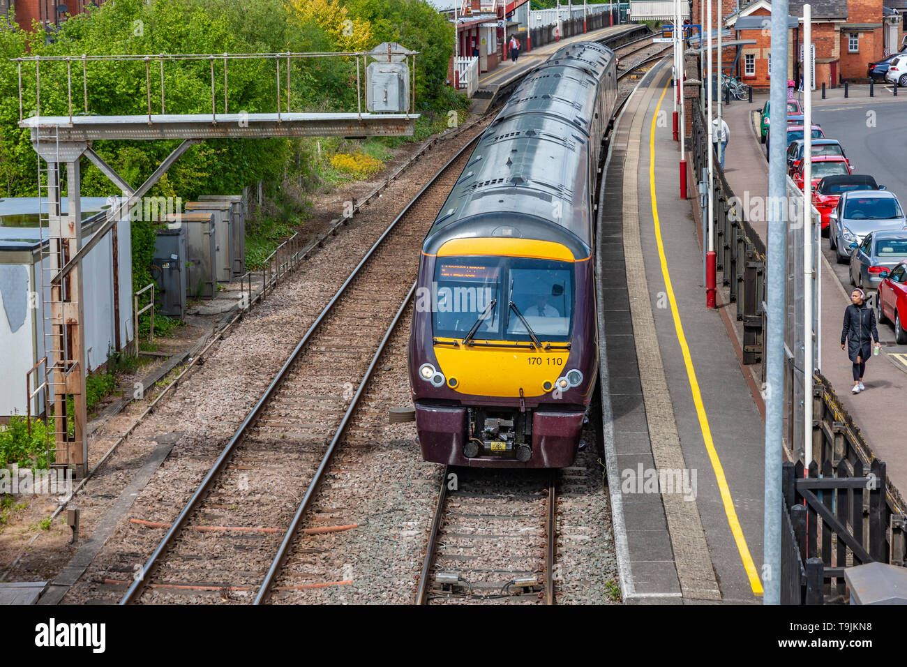 Train pulling into Oakham station on a Friday afternoon, looking down ...