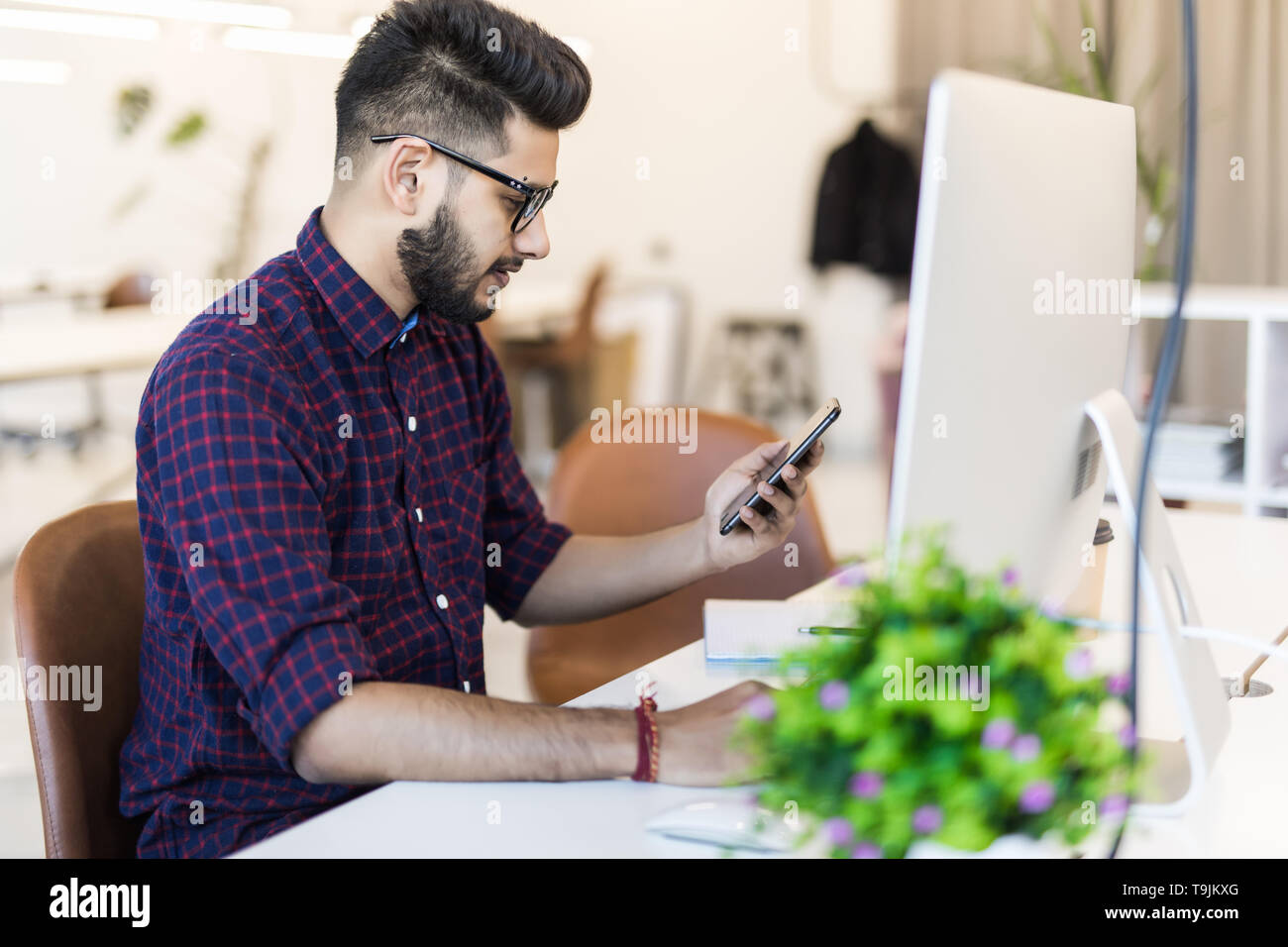 Indian businessman working on computer hi-res stock photography and ...