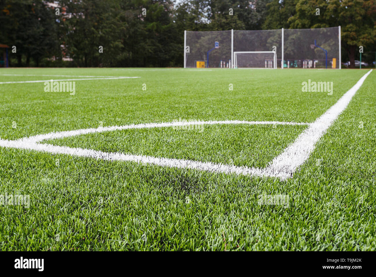 Marking the angle of the football field with artificial surface Stock ...