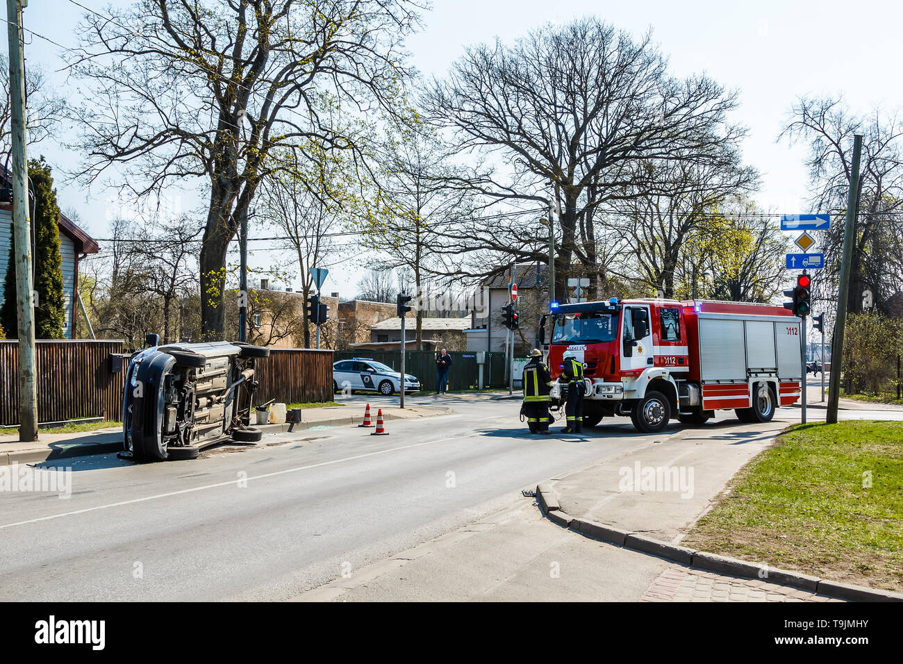 the car drove through the intersection to the red signal of the traffic ...
