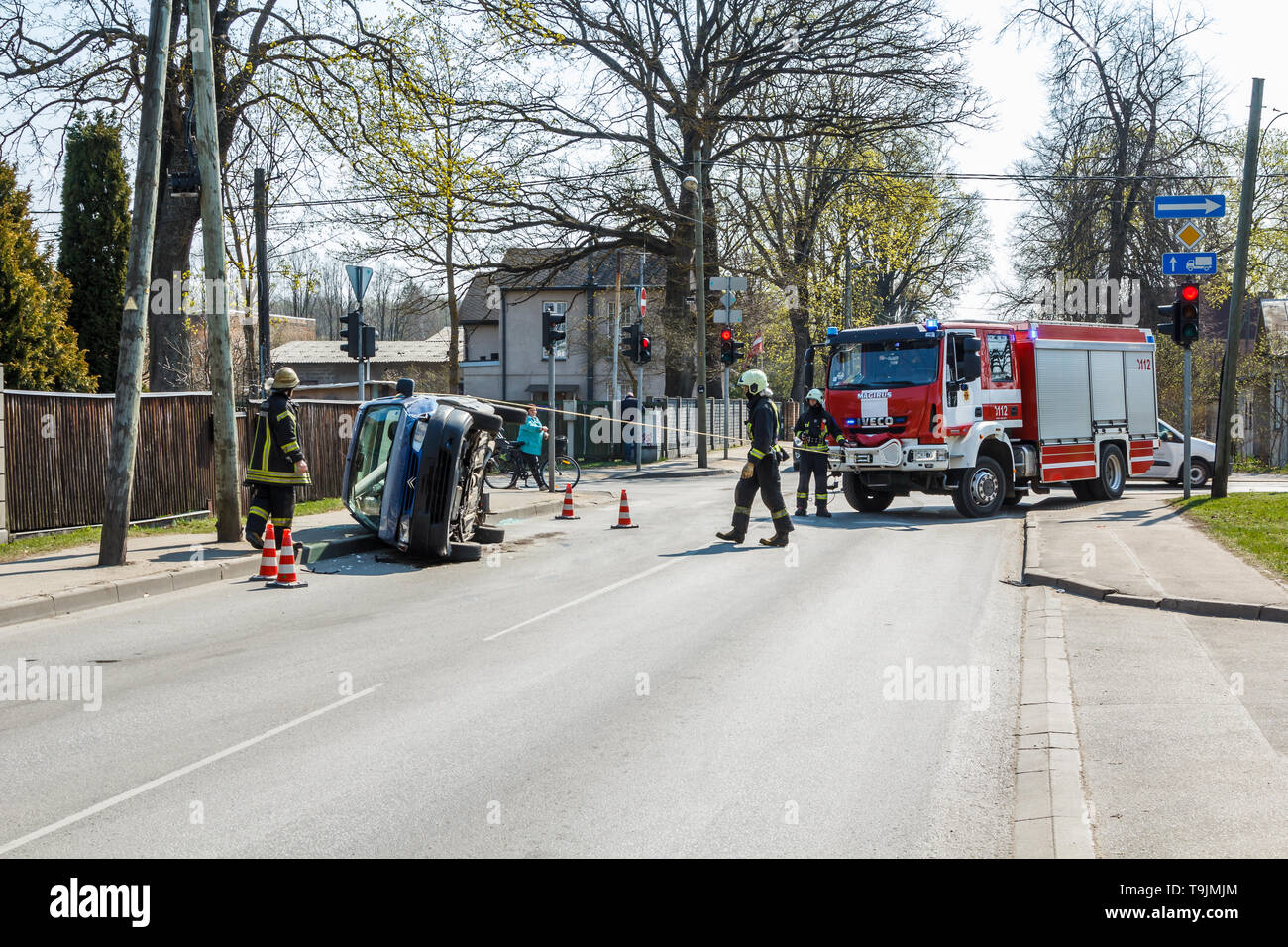 the car drove through the intersection to the red signal of the traffic ...