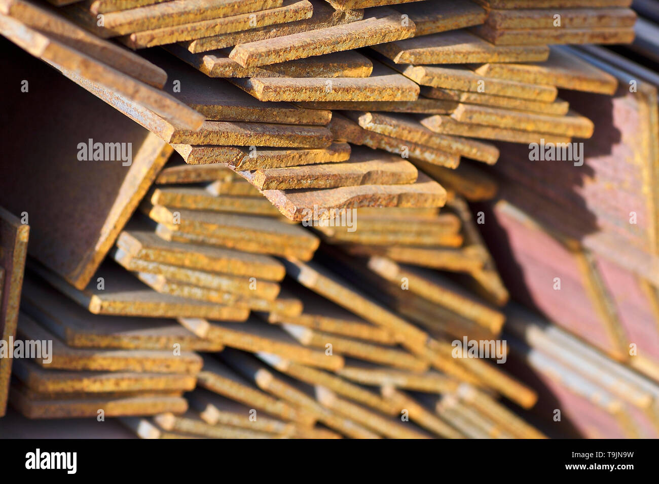 Metal profile strip in packs at the warehouse of metal products, Russia ...