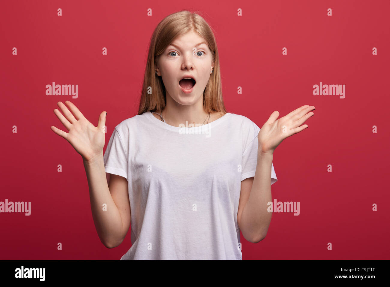 blonde woman in casual clothes shouting at somebody, gesture concept ...