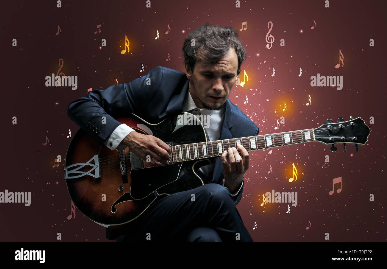 Young guitarist with falling musical notes wallpaper and classical ...