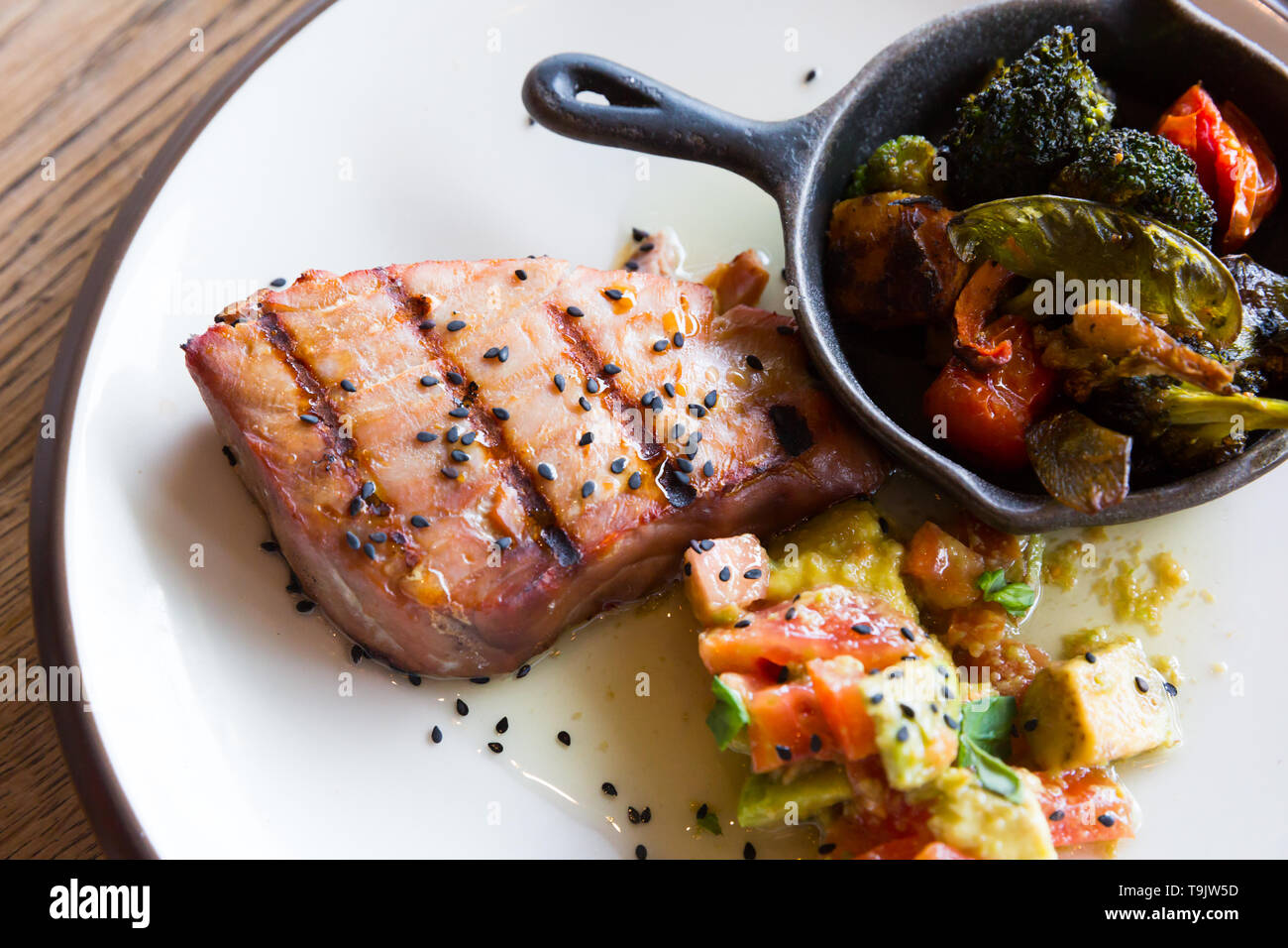 Delicious treat for seafood lovers - grilled tuna steak with vegetable ...