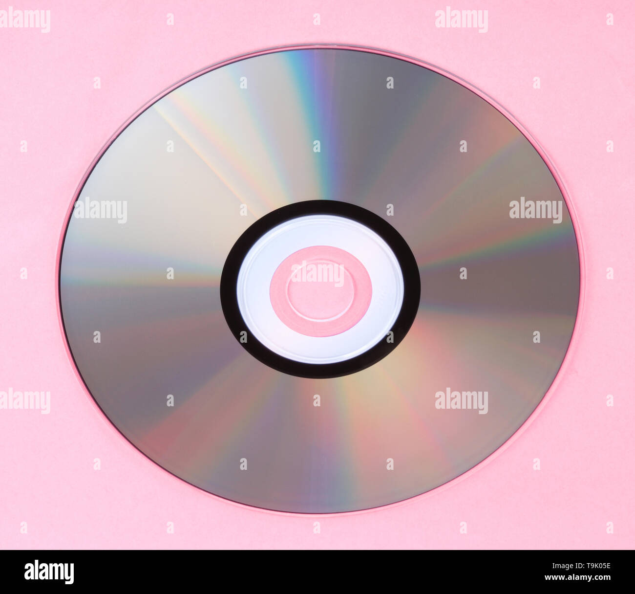 compact disc on pink background Stock Photo - Alamy