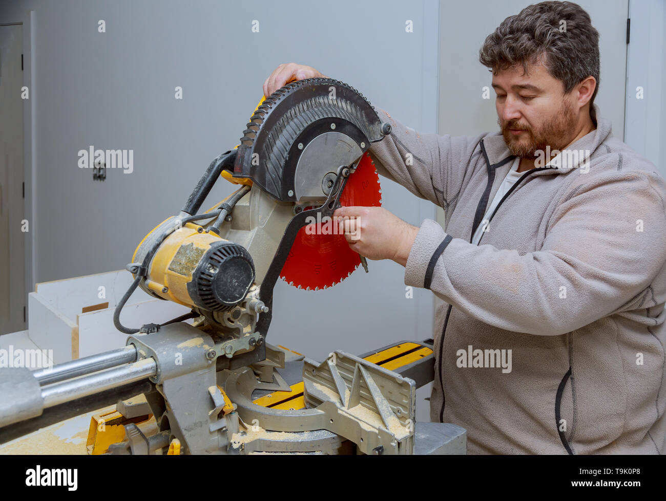 Replace a saw in a wood cutting electric saw in handyman working Stock ...