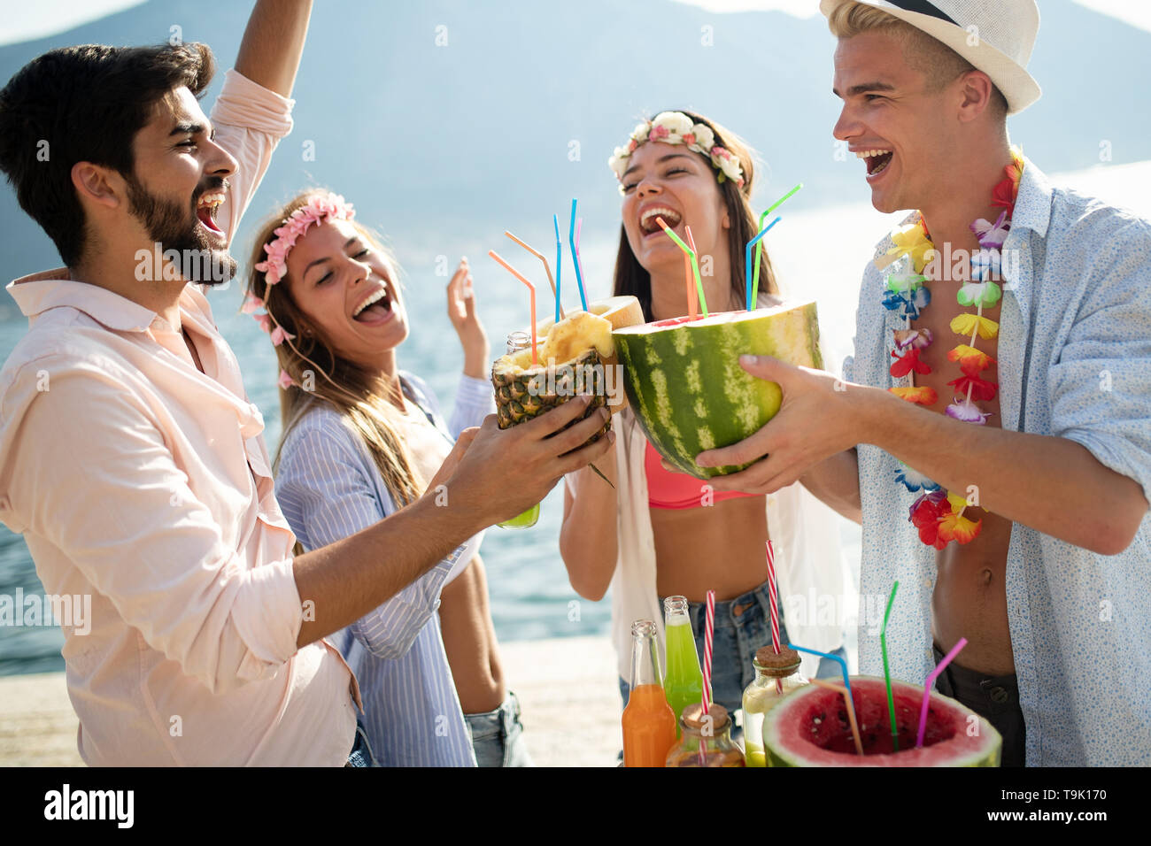 Female friends enjoying beach sunset hi-res stock photography and ...