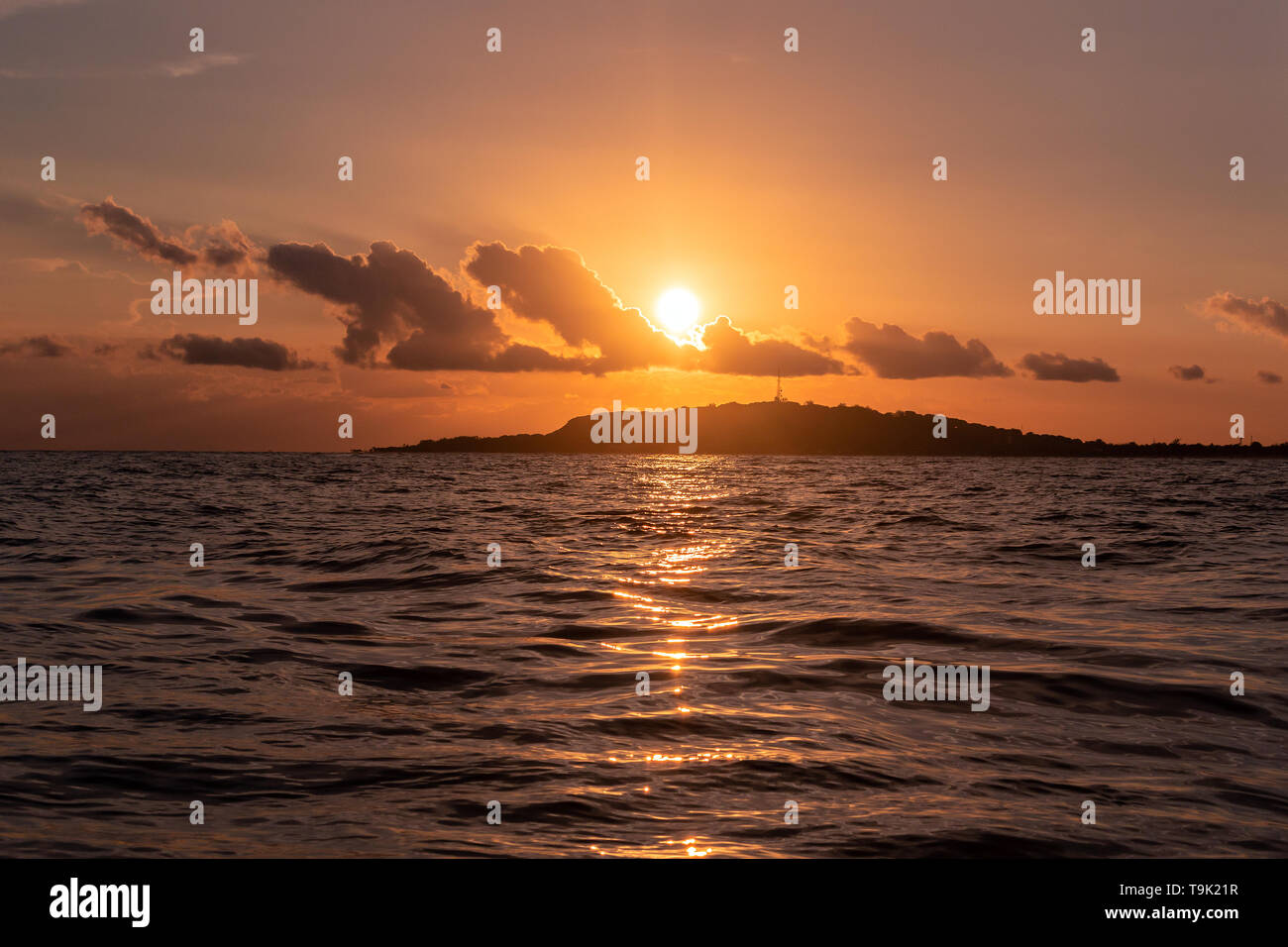 Sunset at the sea, dramatic sky, indonesia Stock Photo - Alamy
