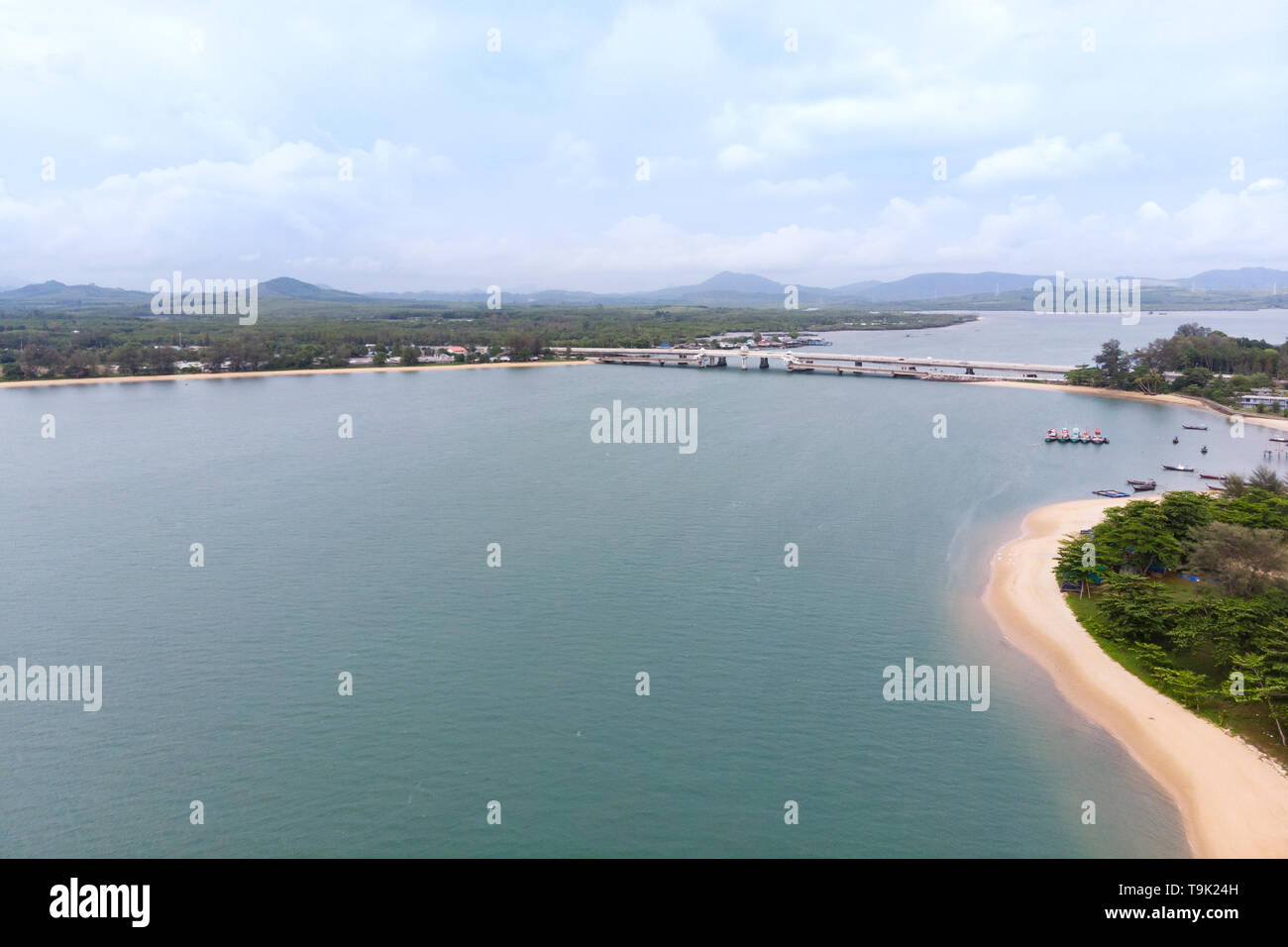 Scenic landscape of big river and reservoir dam with mountain and ...