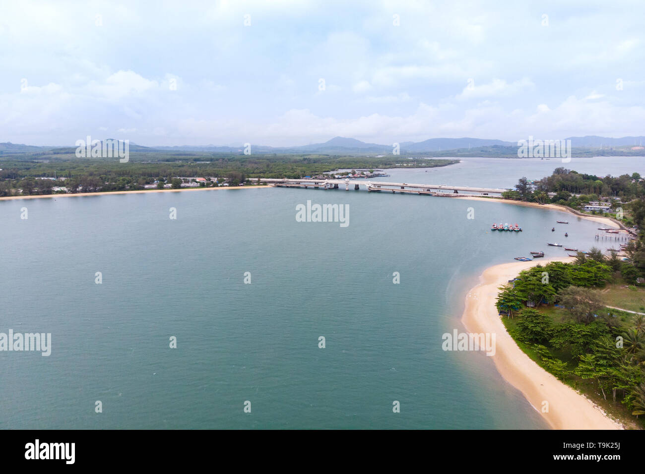 Scenic landscape of big river and reservoir dam with mountain and ...