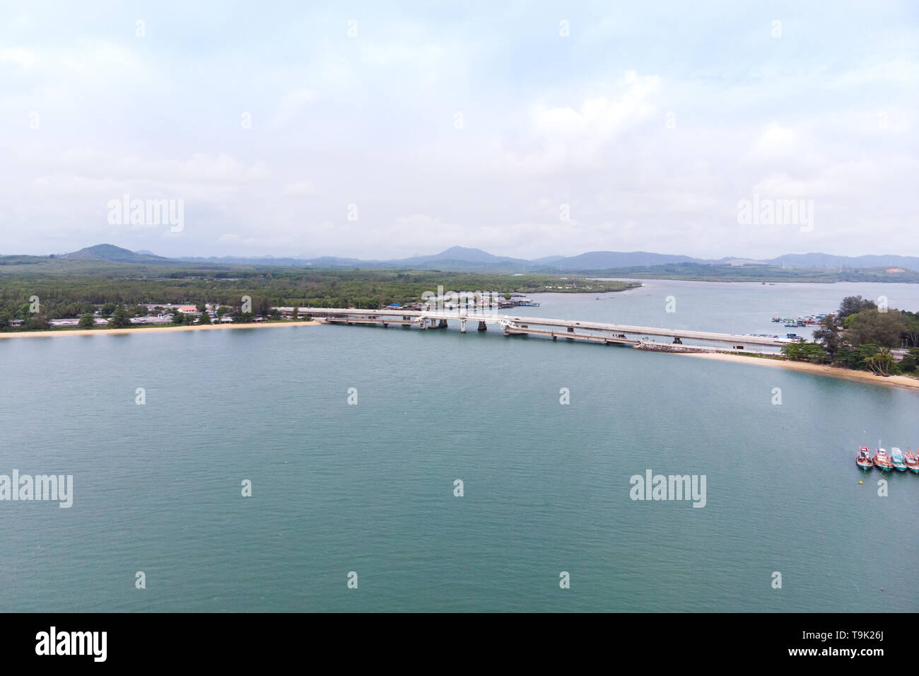 Scenic landscape of big river and reservoir dam with mountain and ...
