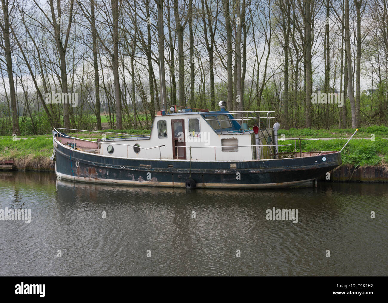 Old boat with many rust spots along the side Stock Photo - Alamy
