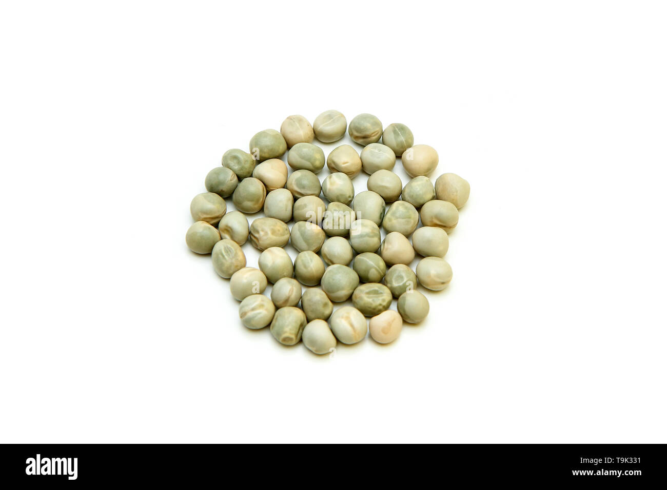 The small amount, a pile, of green peas isolated on a white background ...
