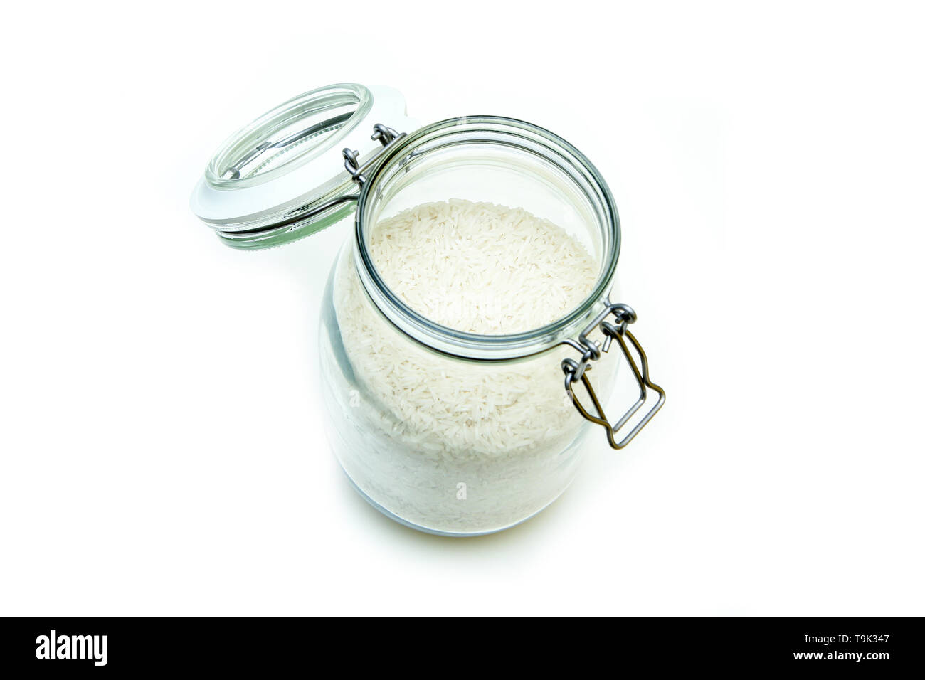 The rice stored inside the closable glass bottle isolated on a white ...