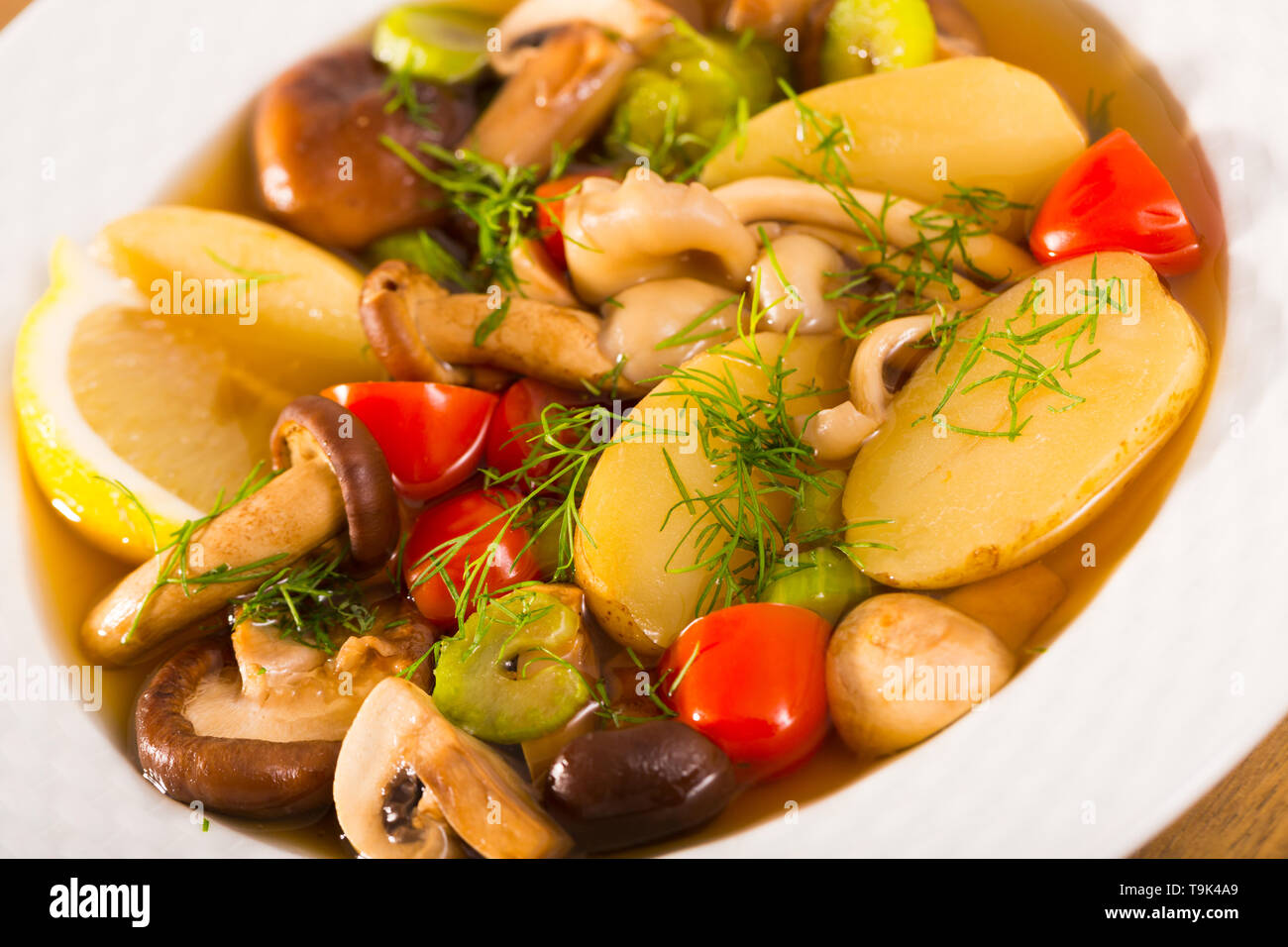 Mushroom hoosh boiled with honey fungus, lemon and vegetables Stock ...
