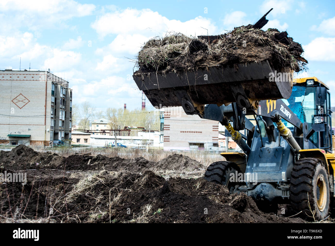 Chelyabinsk region, Russia - May 2019: bulldozer pushes the ground ...