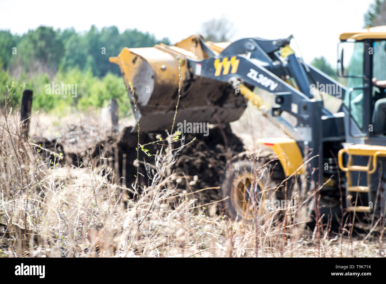 Chelyabinsk region, Russia - May 2019: bulldozer pushes the ground ...