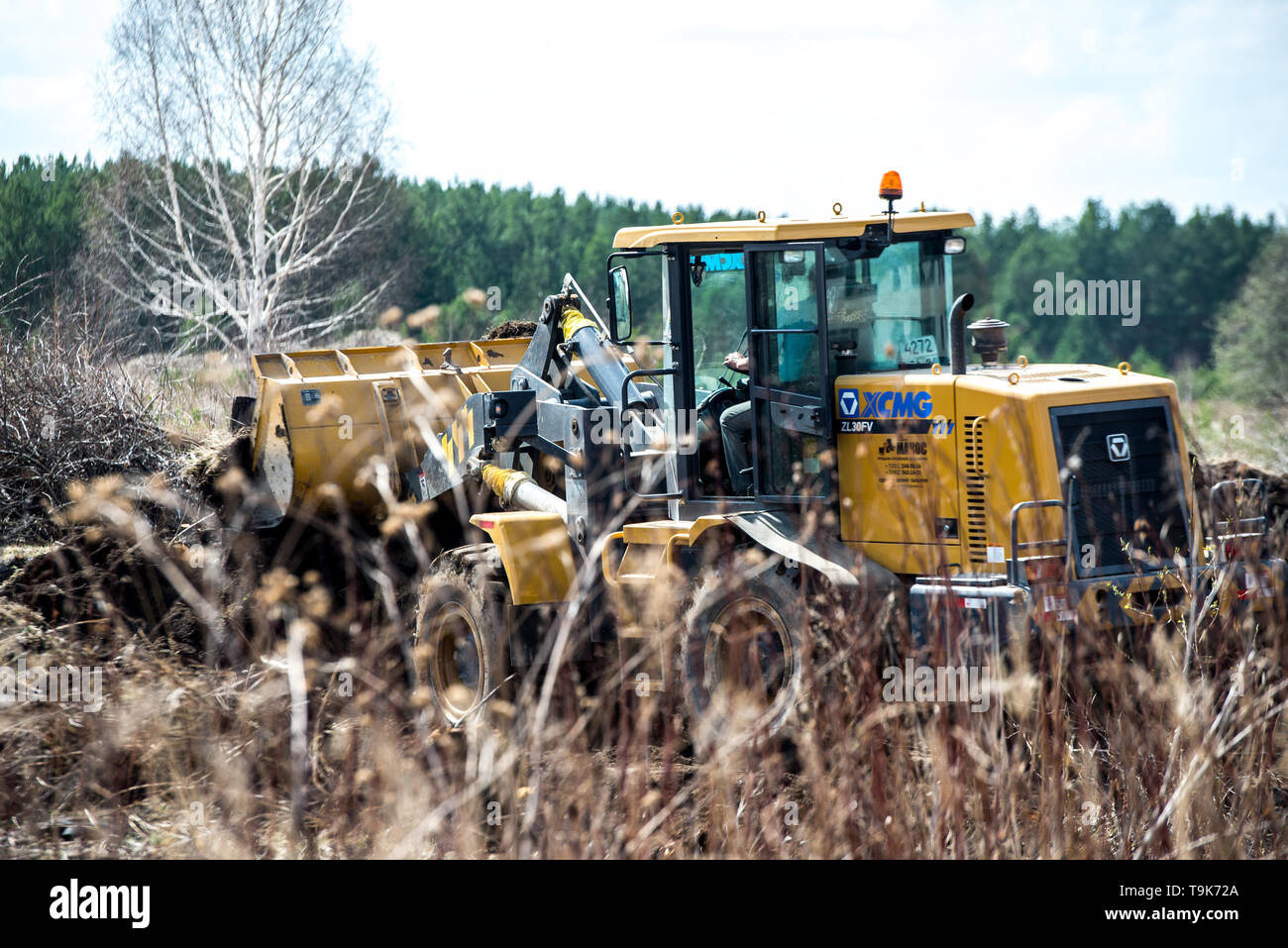 Chelyabinsk region, Russia - May 2019: bulldozer pushes the ground ...