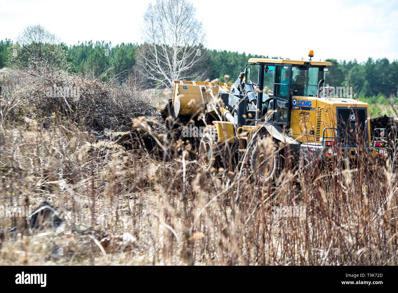 Chelyabinsk region, Russia - May 2019: bulldozer pushes the ground ...