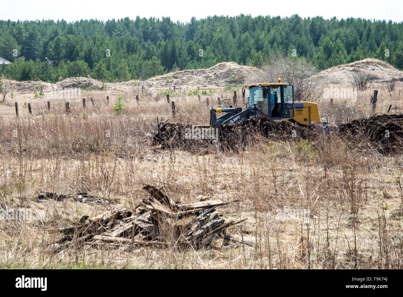 Chelyabinsk region, Russia - May 2019: bulldozer pushes the ground ...