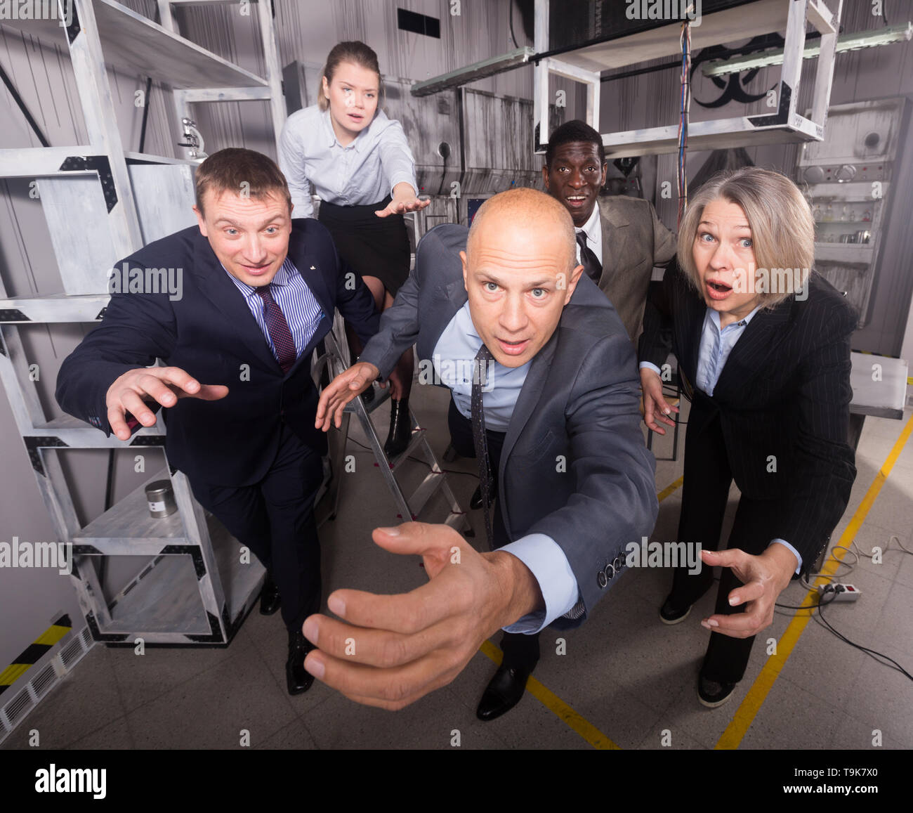 Five men in suits together hi-res stock photography and images - Alamy