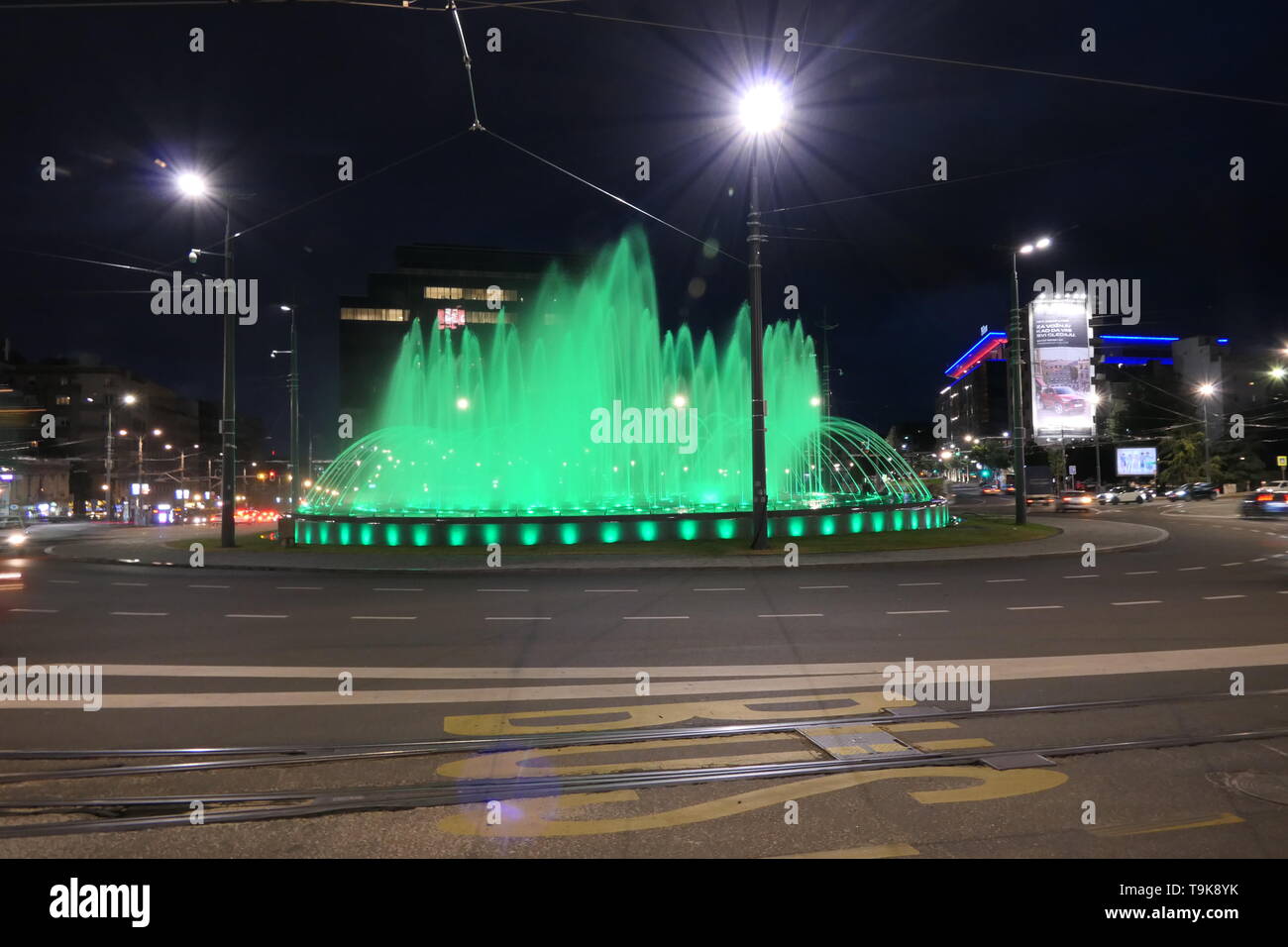 Slavija Square, Traffic circle in central Belgrade by night with green ...