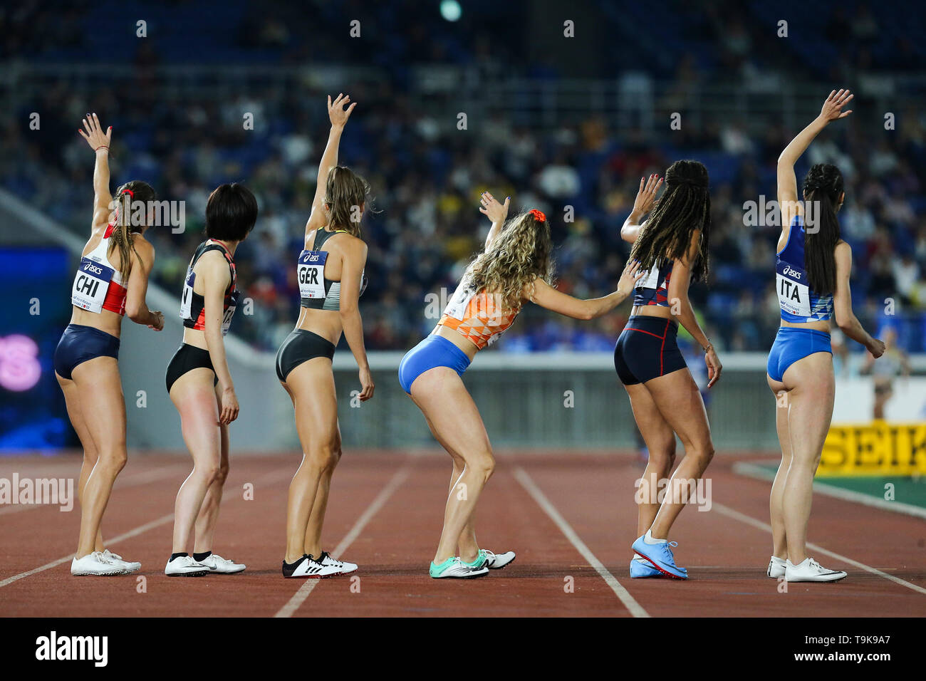 YOKOHAMA, JAPAN - MAY 10: athletes at the change over in the women's ...