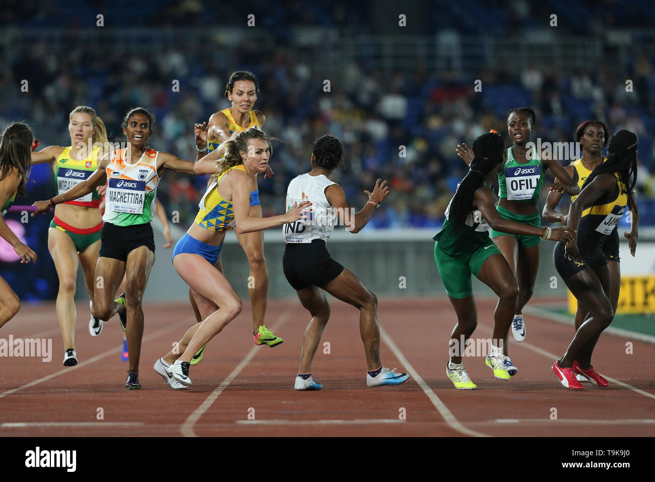 Female Sprinters In Starting Blocks High Resolution Stock Photography ...
