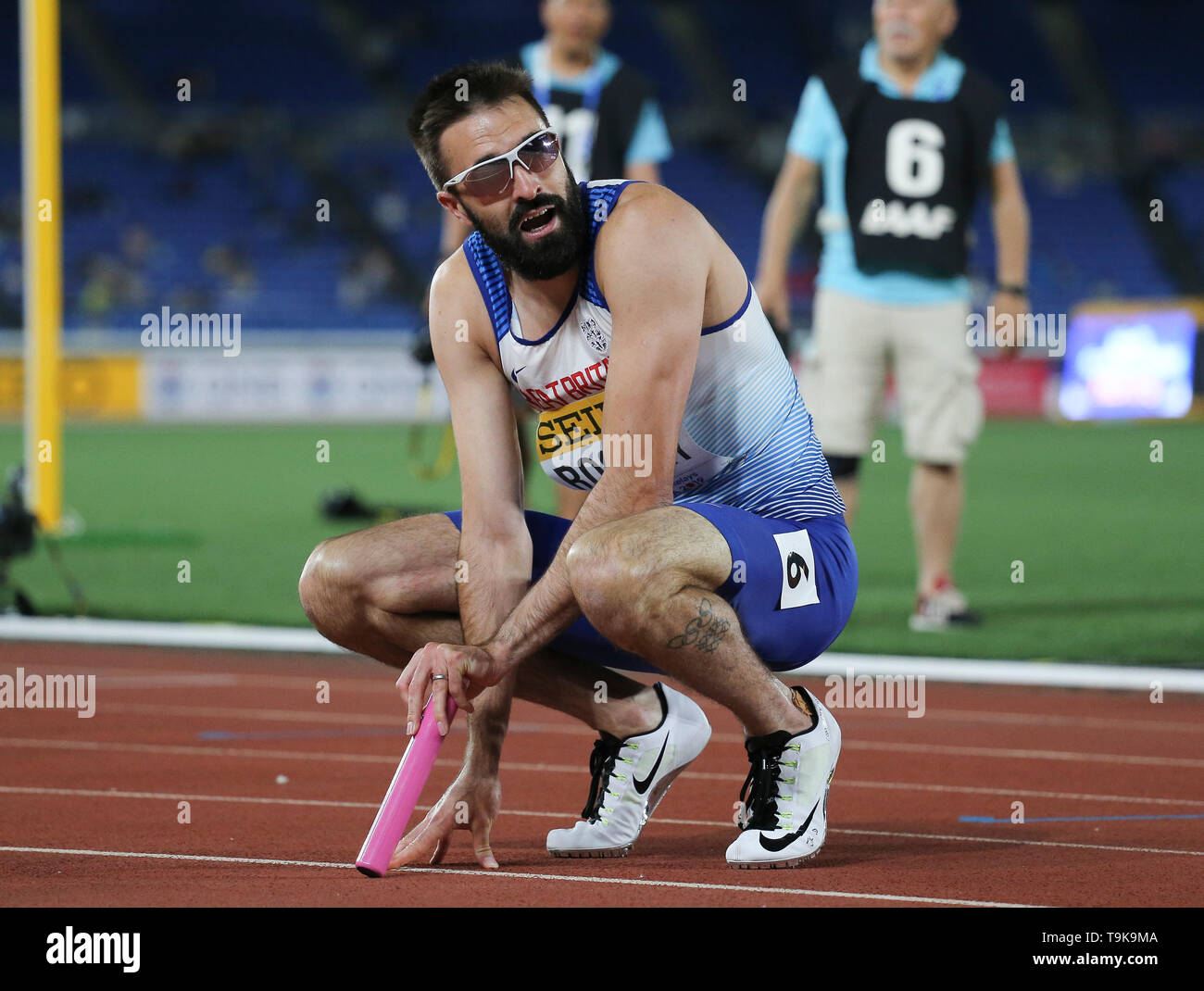 Female sprinters in starting blocks hi-res stock photography and images ...