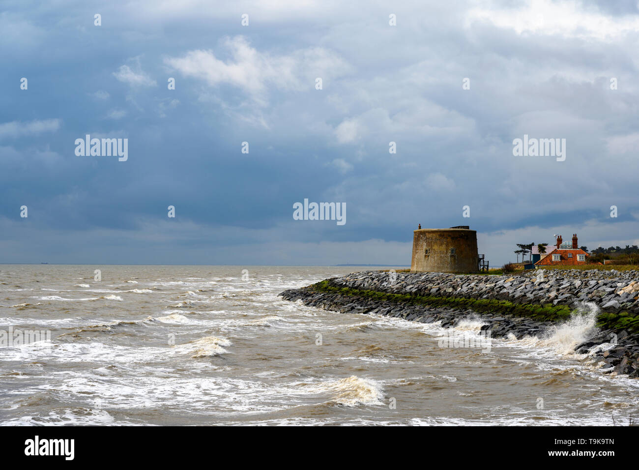 Rock armour coastal defences protecting a Martello Tower, East Lane ...