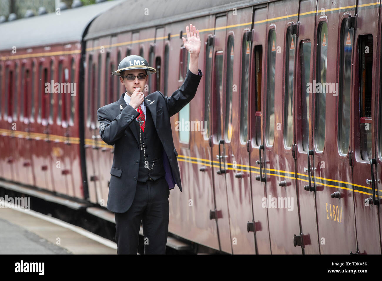 A train guard at Haworth train station during the Haworth 40s weekend ...