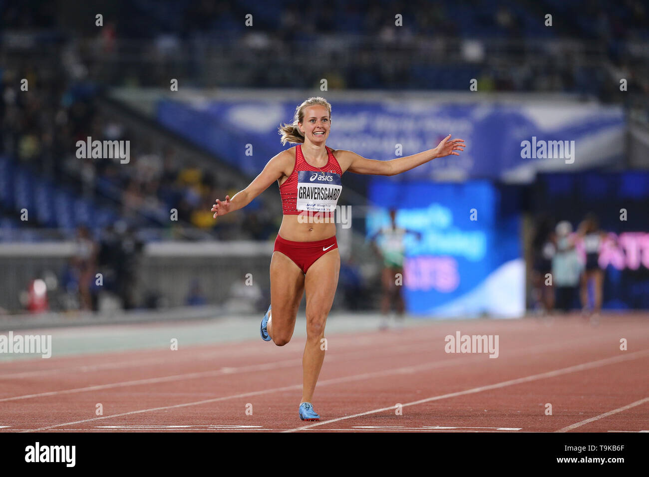 YOKOHAMA, JAPAN - MAY 10: Mette Graversgaard of Denmark runs over to ...