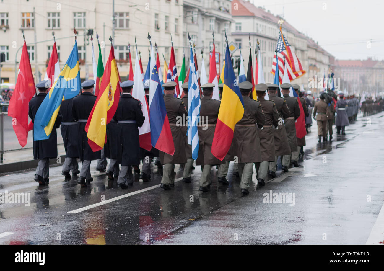 Soldiers of Czech Army with flags are marching on military parade in ...