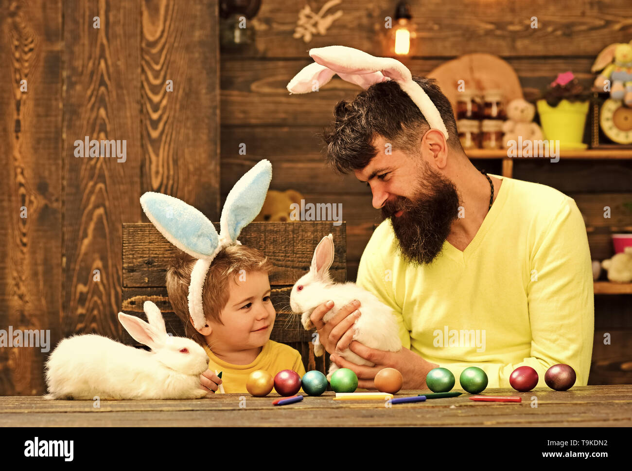 Easter family with fake bunny ears Stock Photo - Alamy