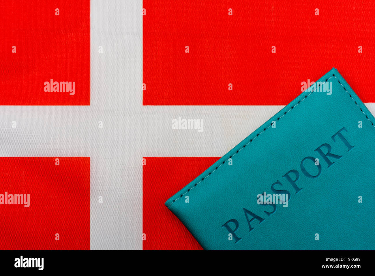 On the flag of Denmark is a passport. The concept of travel and tourism ...