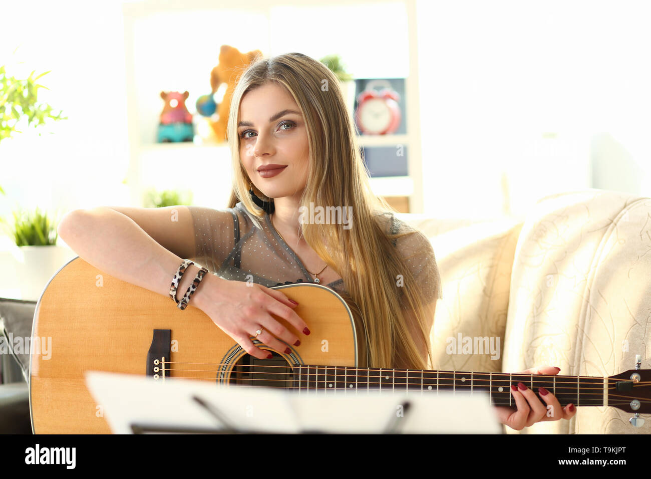 Cute Woman Composer Working on Music Composition Stock Photo - Alamy