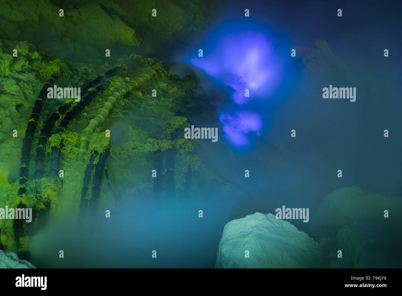 Blue Flame in Sulfur mining at night, Kawah Ijen volcano, East Java ...
