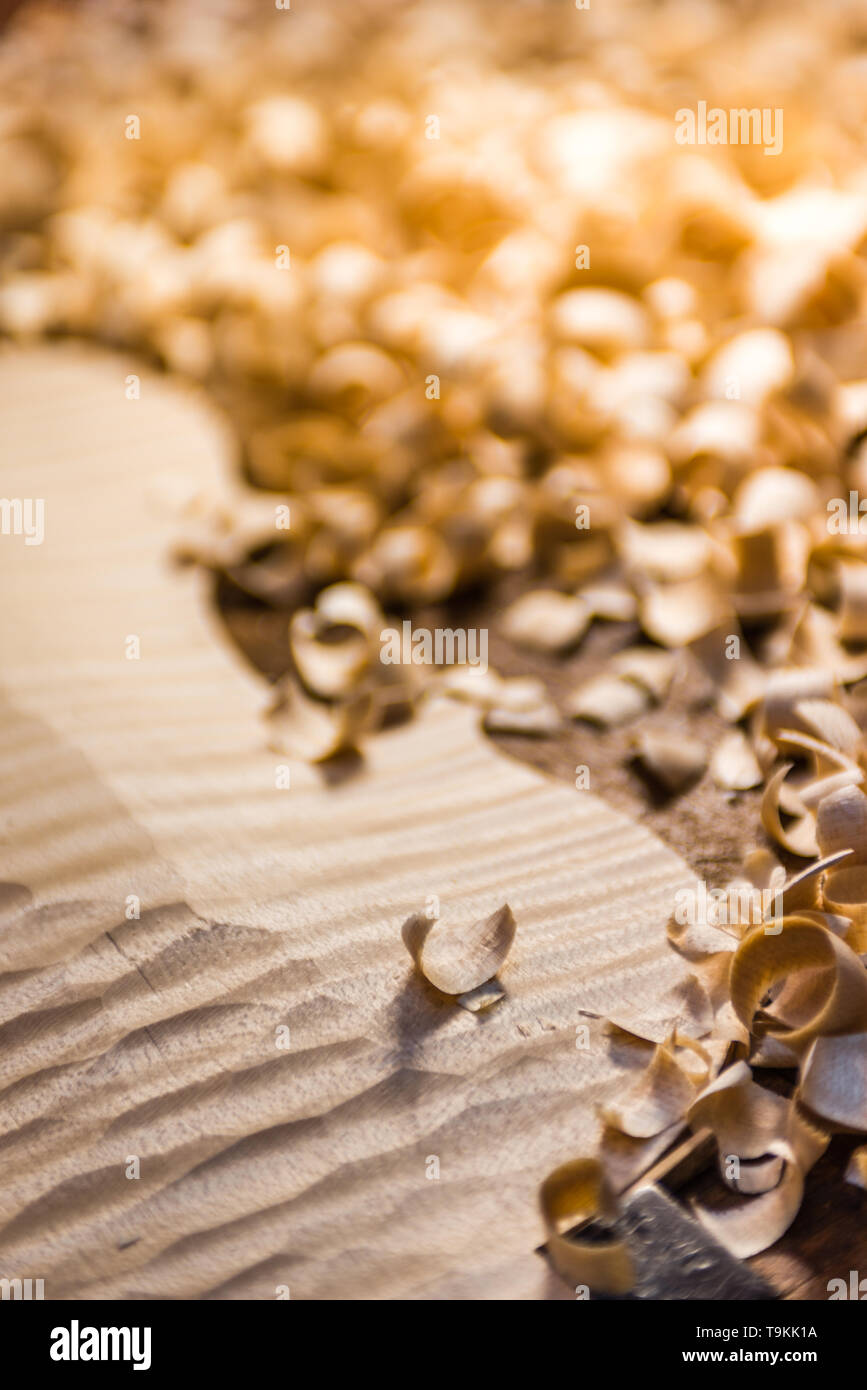 Violin table and wood curls Stock Photo - Alamy