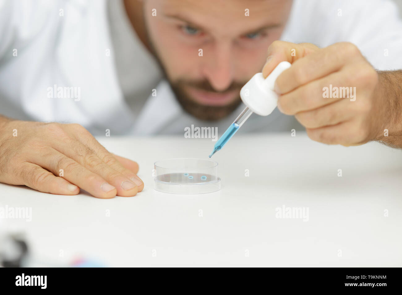 laboratory pipette with drop Stock Photo - Alamy